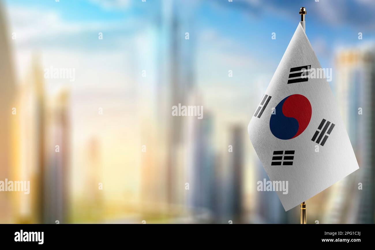 Small flags of the South Korean on an abstract blurry background Stock ...