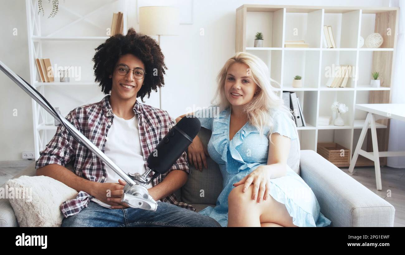 Couple vlog podcast recording presenters speaking Stock Photo - Alamy