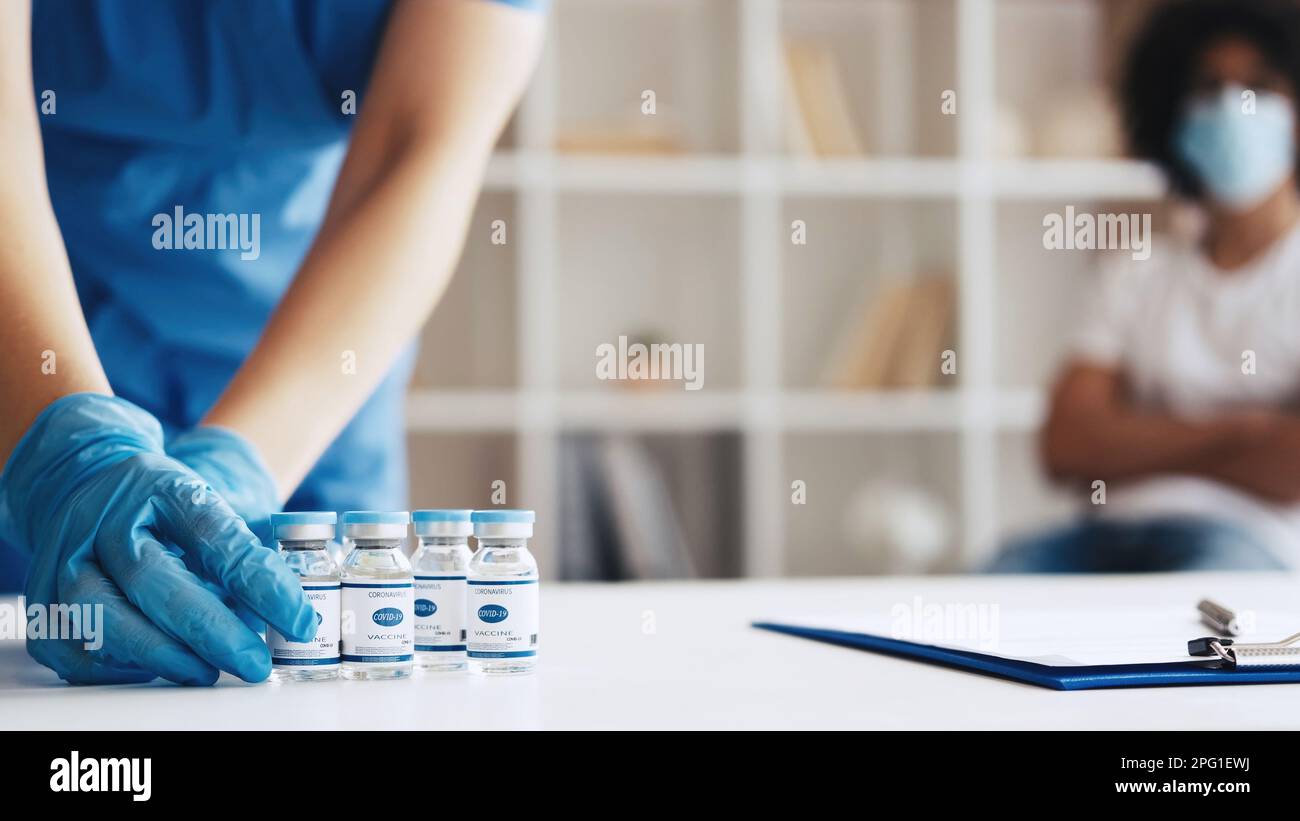 Covid-19 vaccine immunization shot doctor vial Stock Photo - Alamy