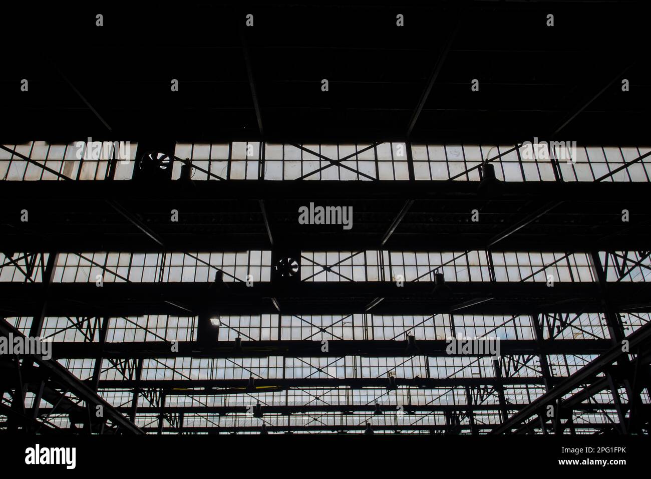 Factory windows opened sequentially. Factory background Stock Photo - Alamy