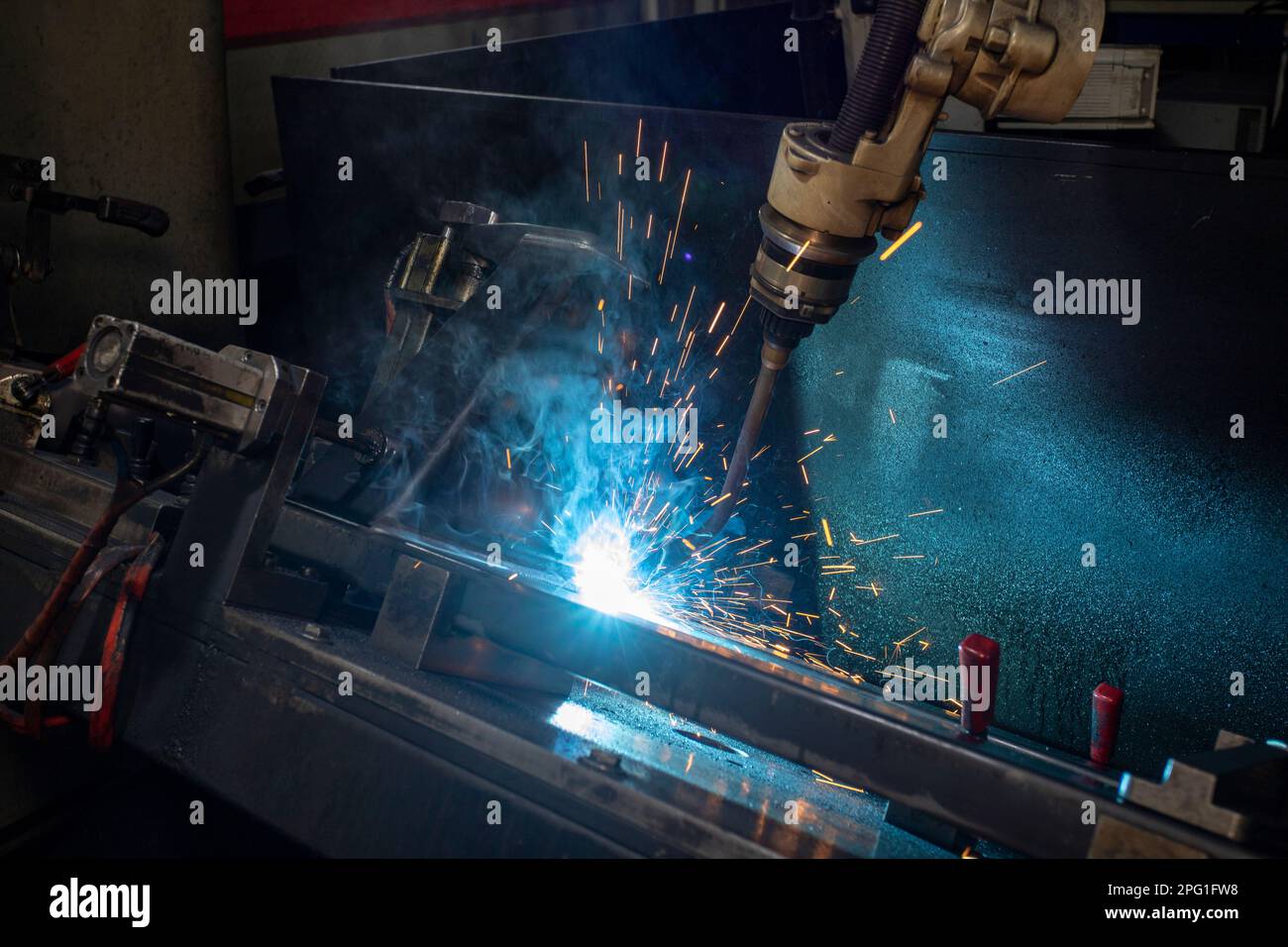 Industrial welding robot. Robot coded to weld is working. Digital ...