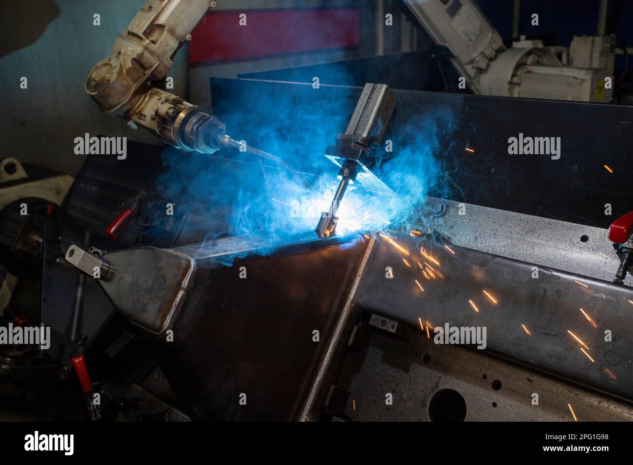 Industrial welding robot. Robot coded to weld is working. Digital ...