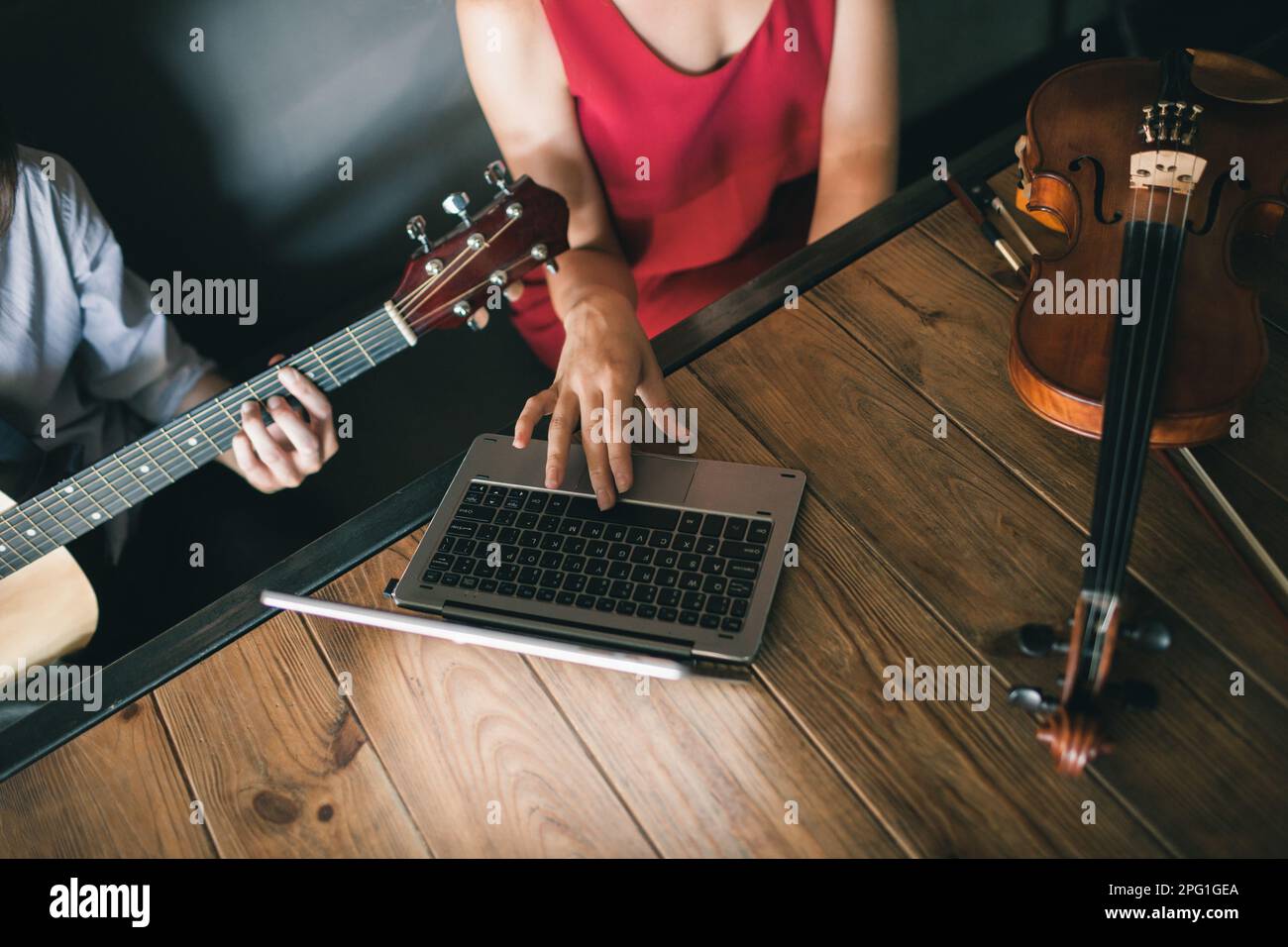 online music school play instrumental lessons Stock Photo - Alamy