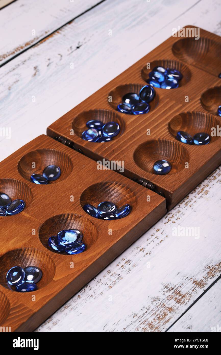 Mangala game board and glass marbles. Historical Turkish game mangala ...