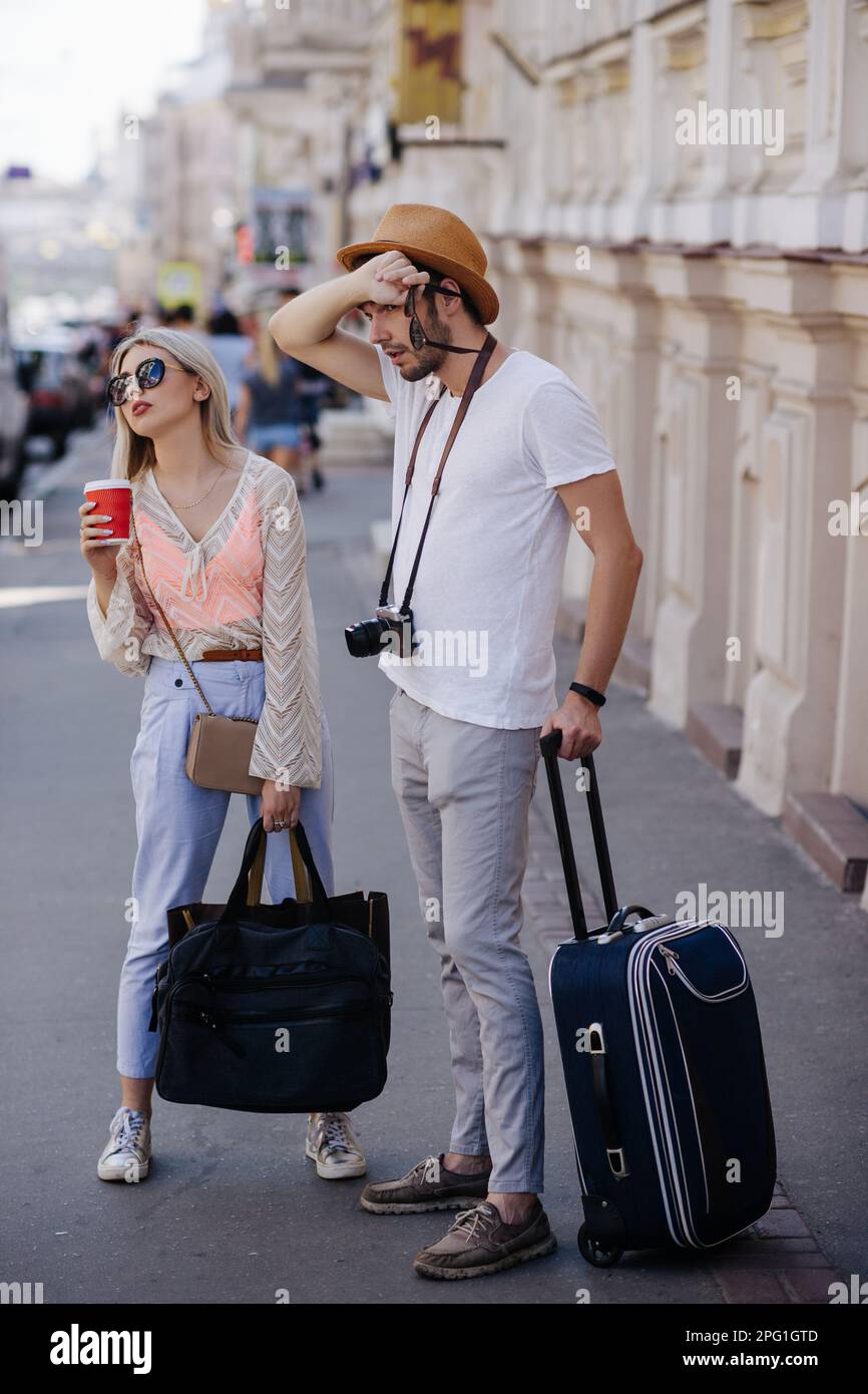 tourism tired traveler family holidays Stock Photo - Alamy