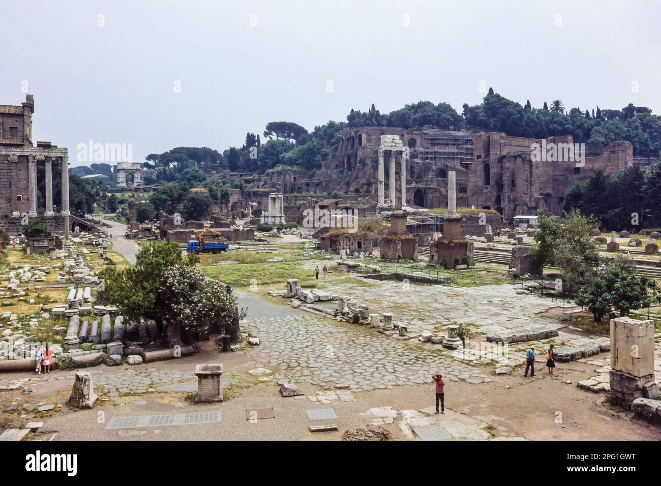 Forum romanum in Rome with tourists in the 80s Stock Photo - Alamy