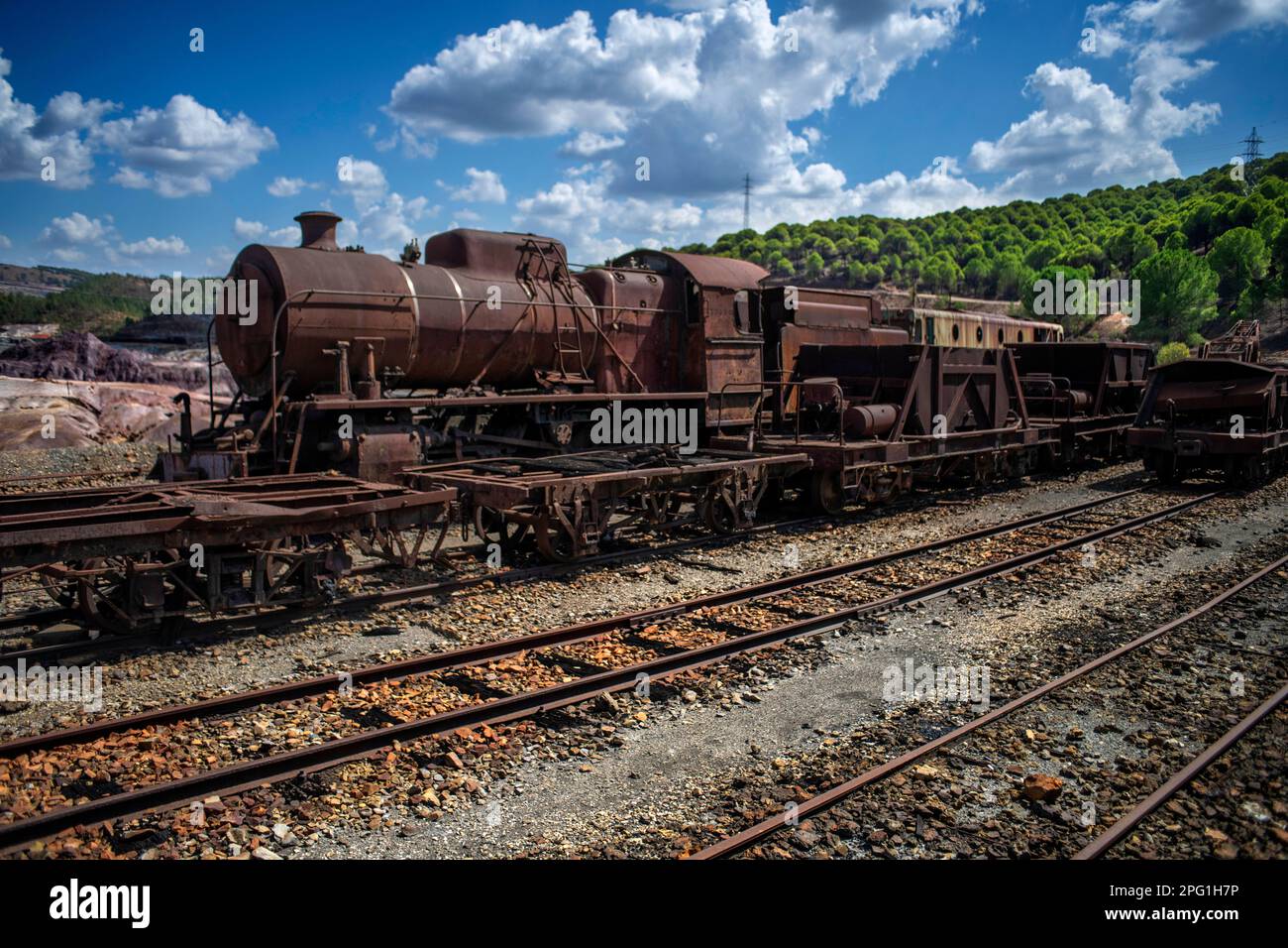 Old abandoned steam trains seen from the touristic train used for ...