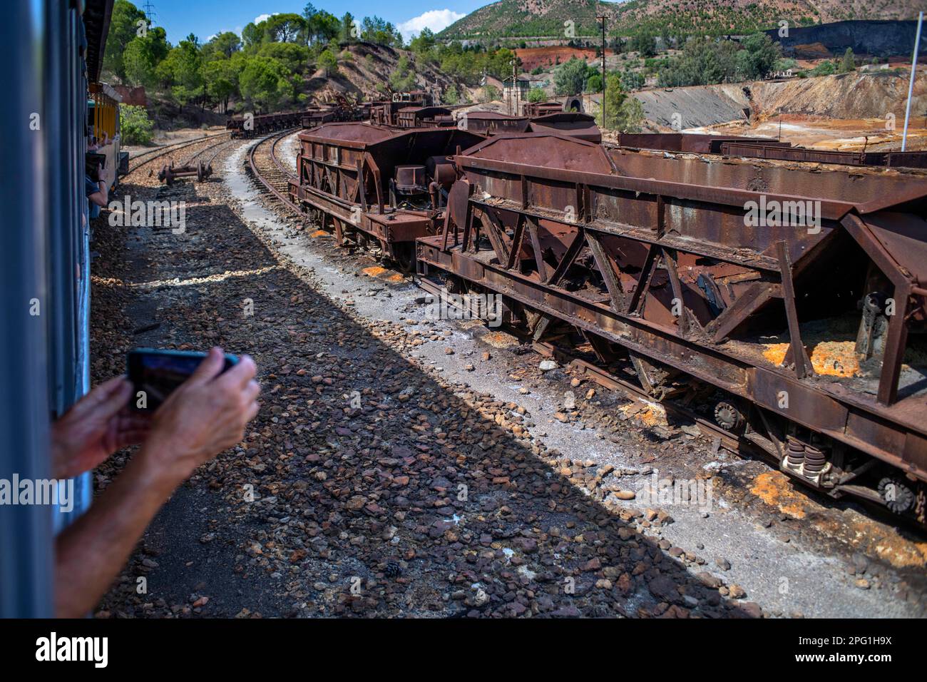 Old abandoned steam trains seen from the touristic train used for ...