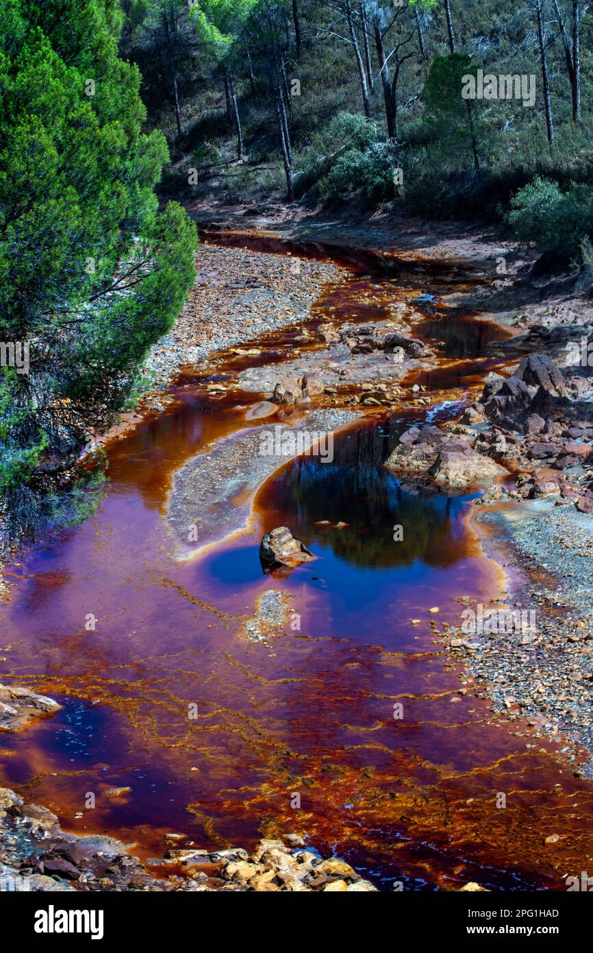 Blood red mineral laden water Rio Tinto river Minas de Riotinto mining ...