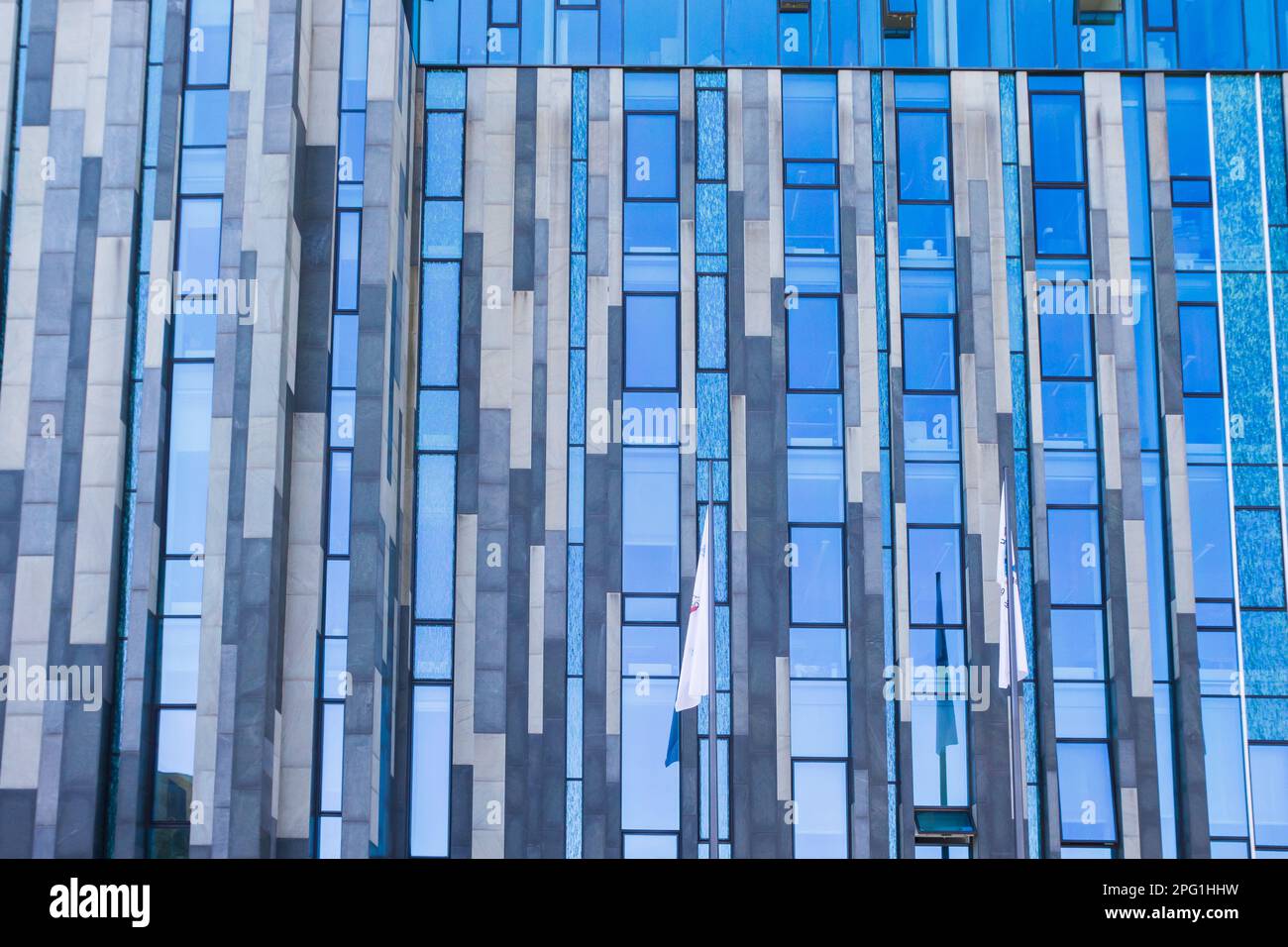 Blue glass facade of the modern university in Leipzig, Germany Stock ...