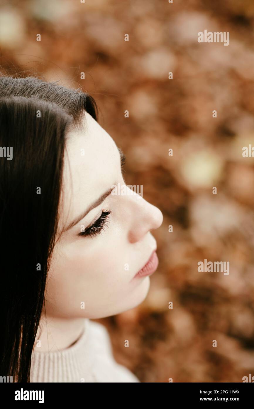 Side view woman long dark hi-res stock photography and images - Alamy