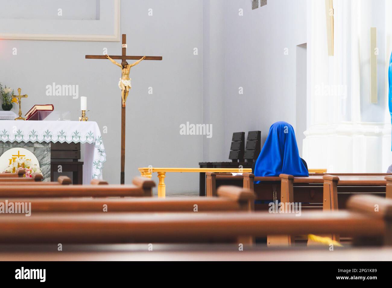 People pray in the church. Church parish. Believers sit on benches in ...