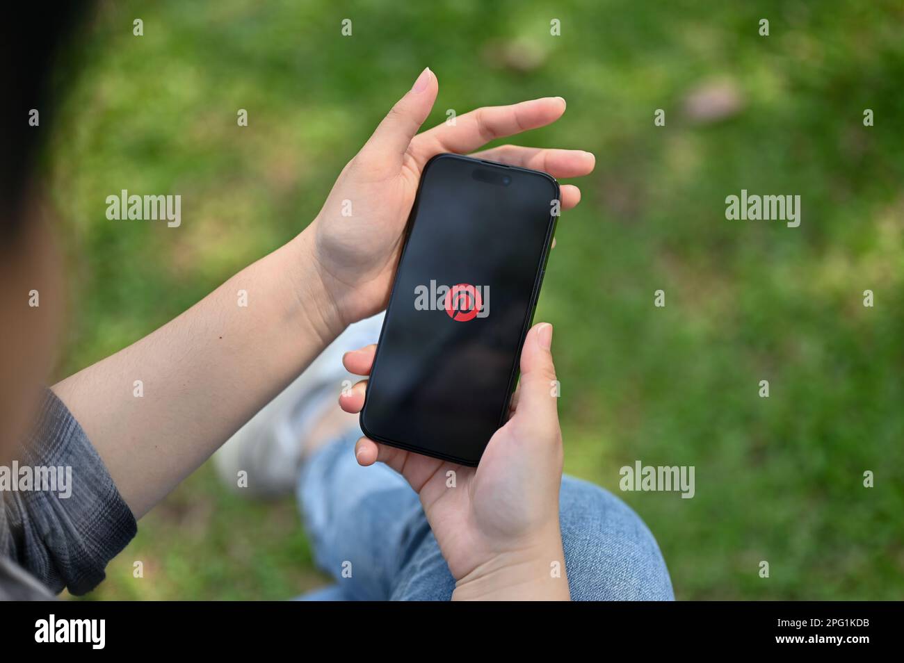 Chiang Mai, Thailand - March 16 2023: An Asian woman using Pinterest ...