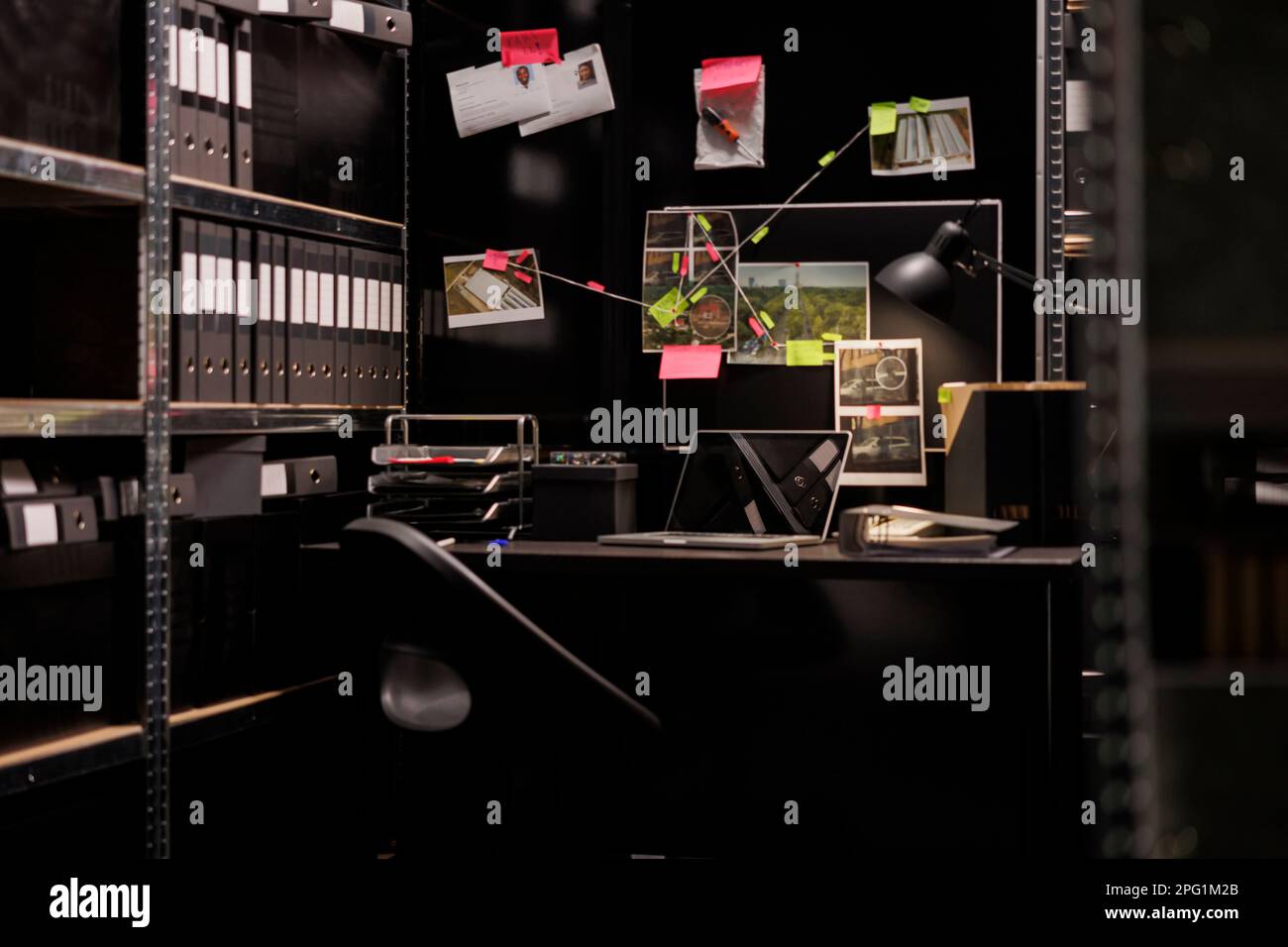 Private investigator office with detective board and desk at night time ...