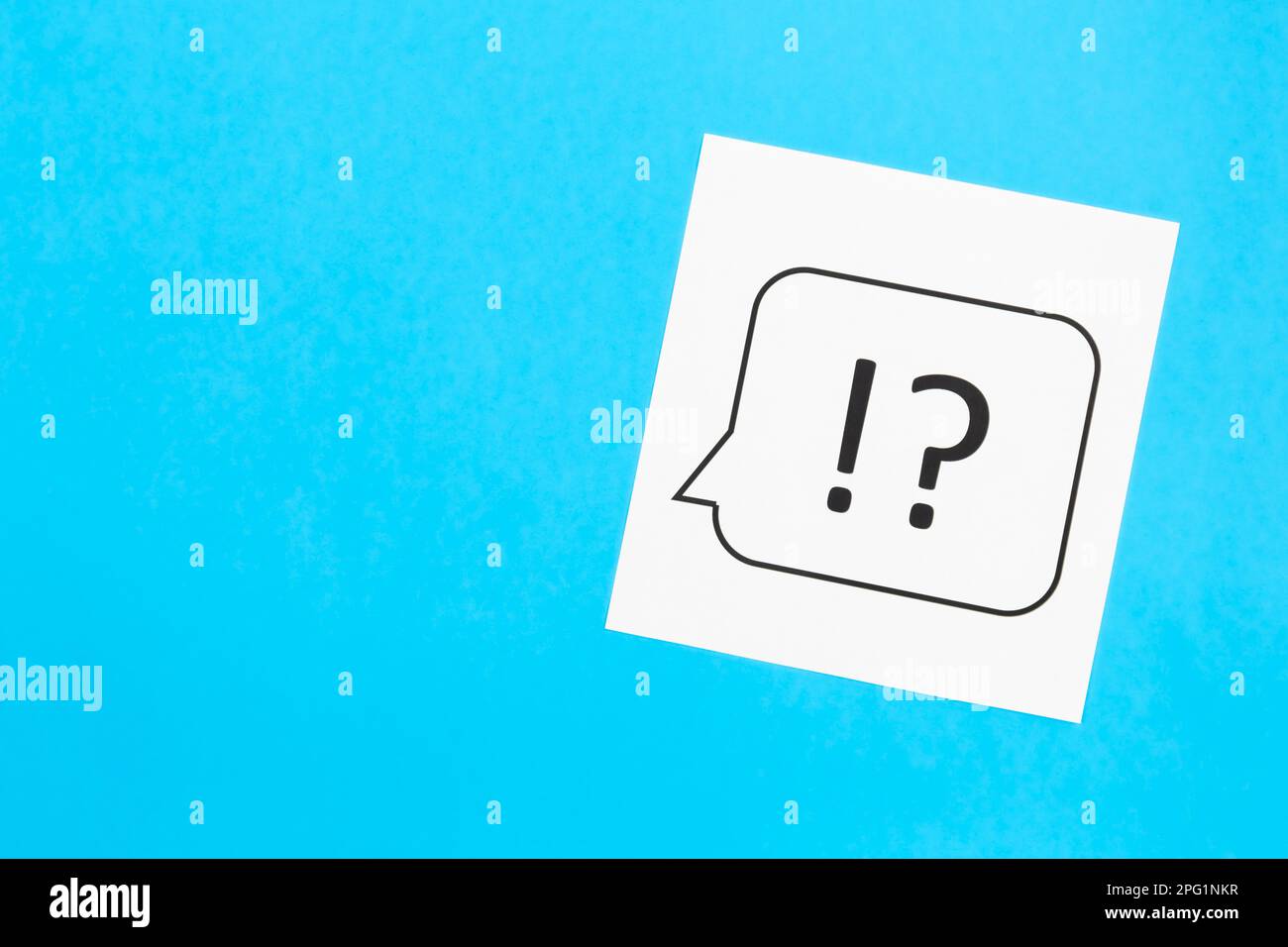 Question mark and exclamation mark on paper on blue background, flat ...