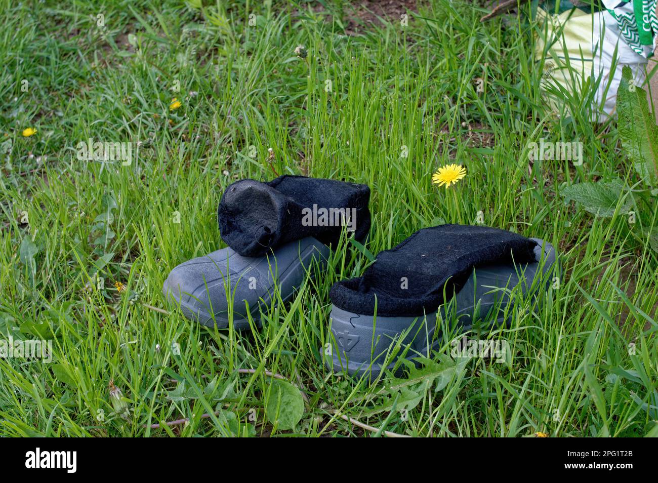rubber galoshes on the floor, in the village Stock Photo - Alamy