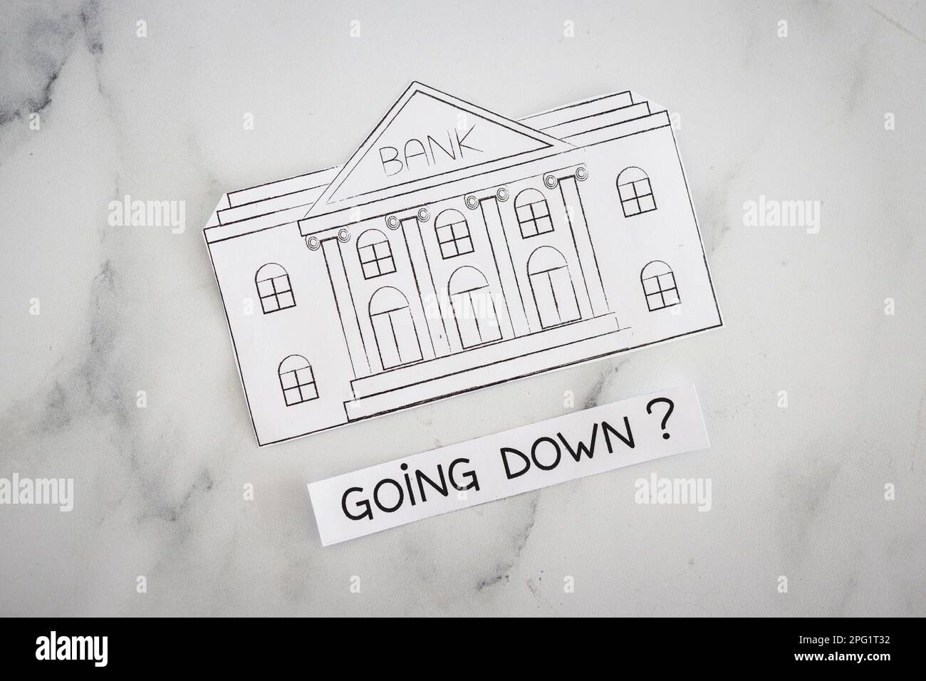 bank made of paper with Going Down ? caption underneath, concept of ...