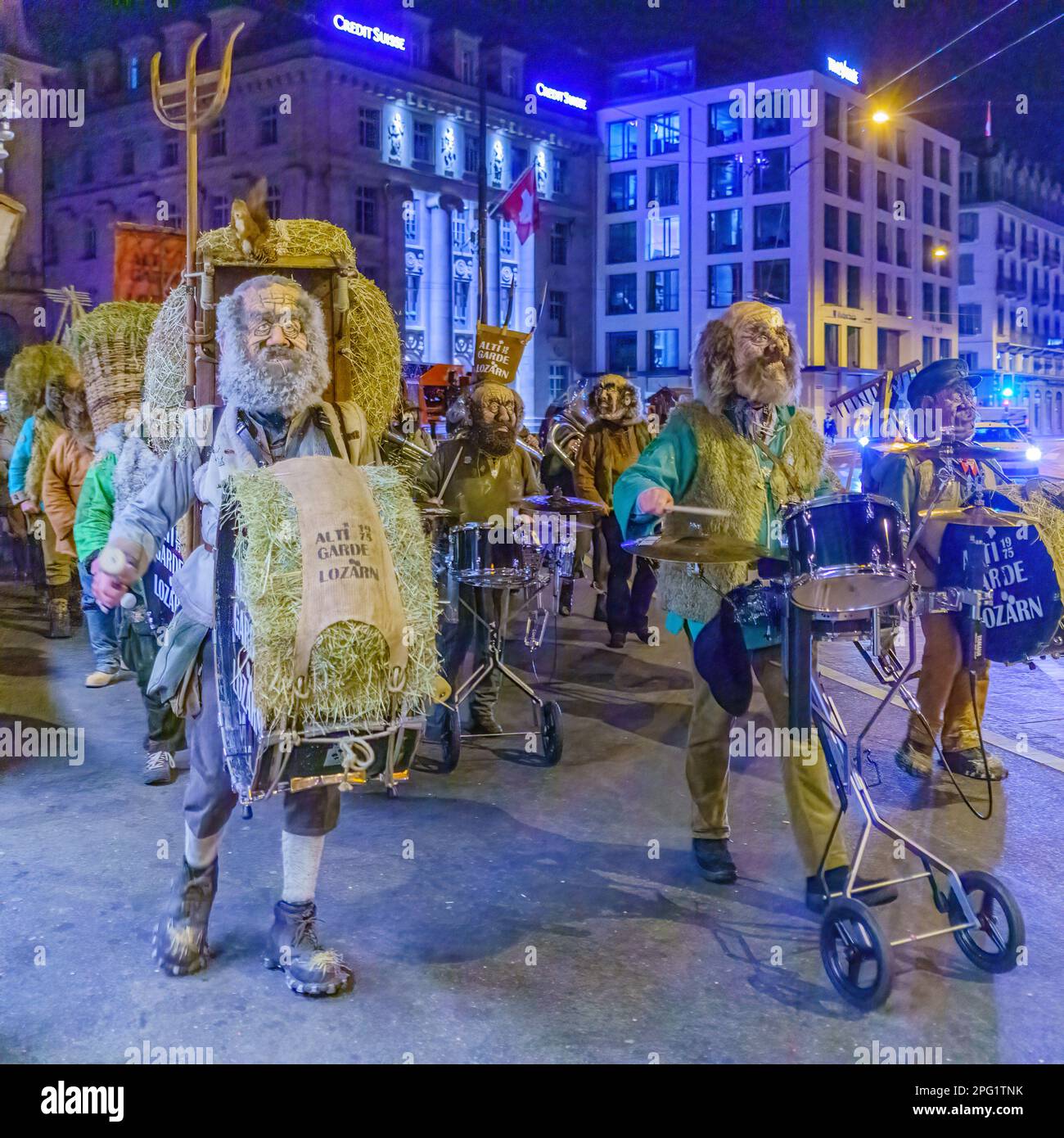 Lucerne, Switzerland - February 20, 2023: Band of musicians in costumes ...