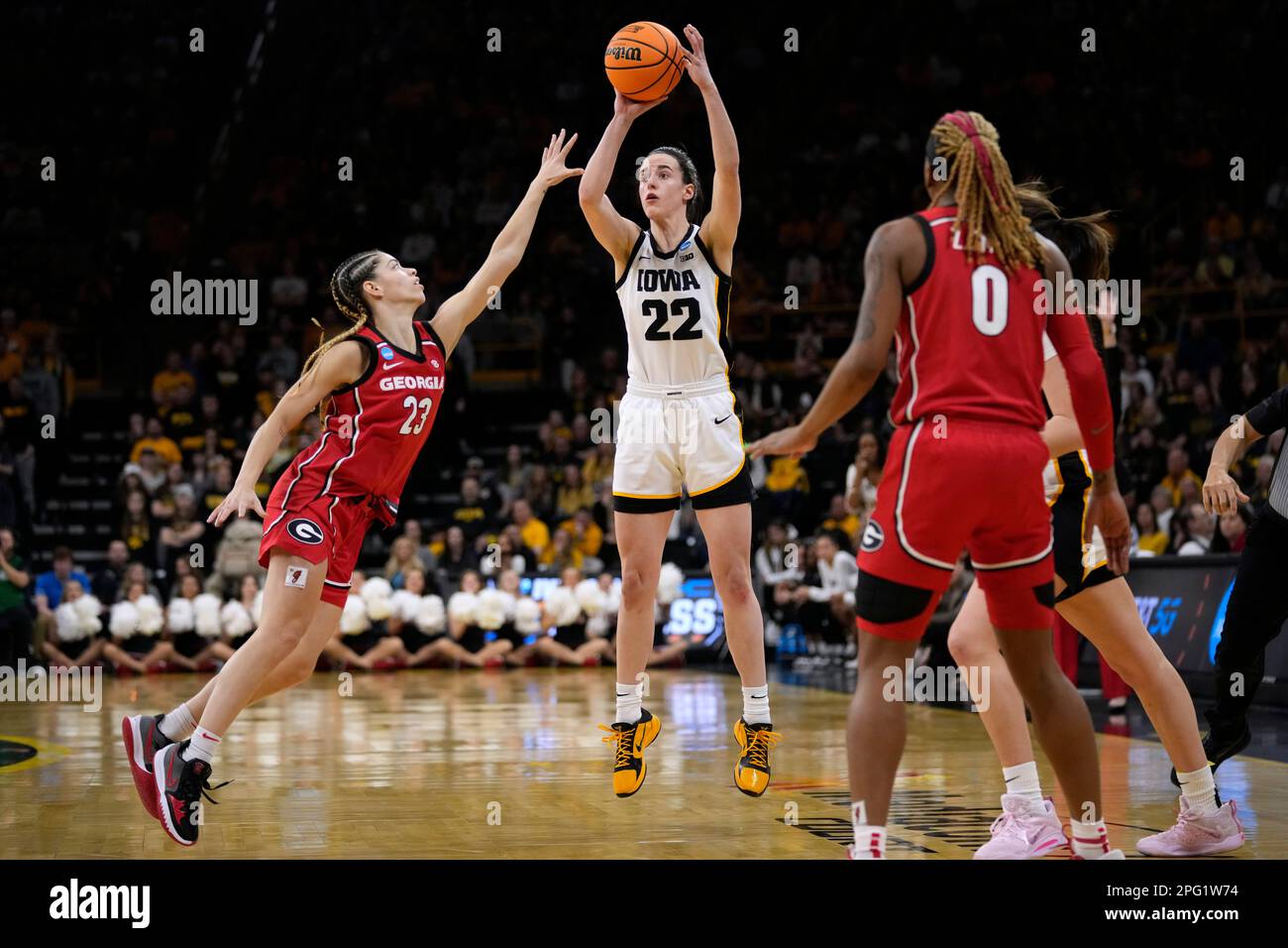 Iowa guard Caitlin Clark (22) shoots over Georgia guard Alisha Lewis ...