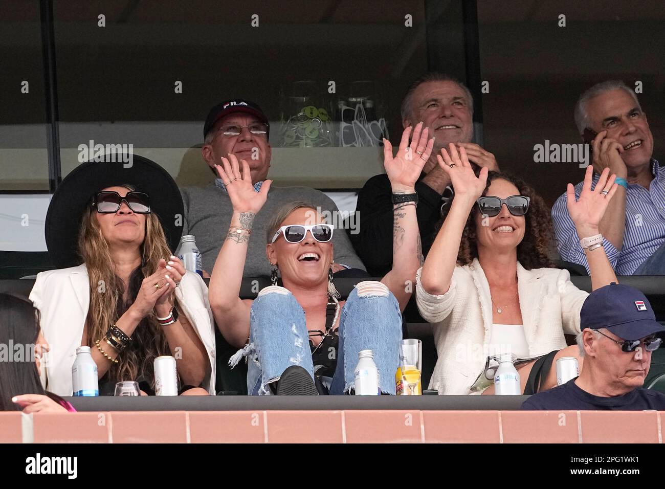Pink, middle, gestures while appearing on a video screen during the ...
