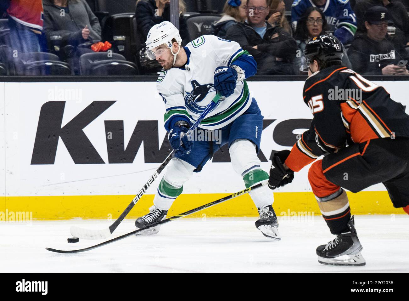 Vancouver Canucks right wing Conor Garland (8) shoots past Anaheim ...