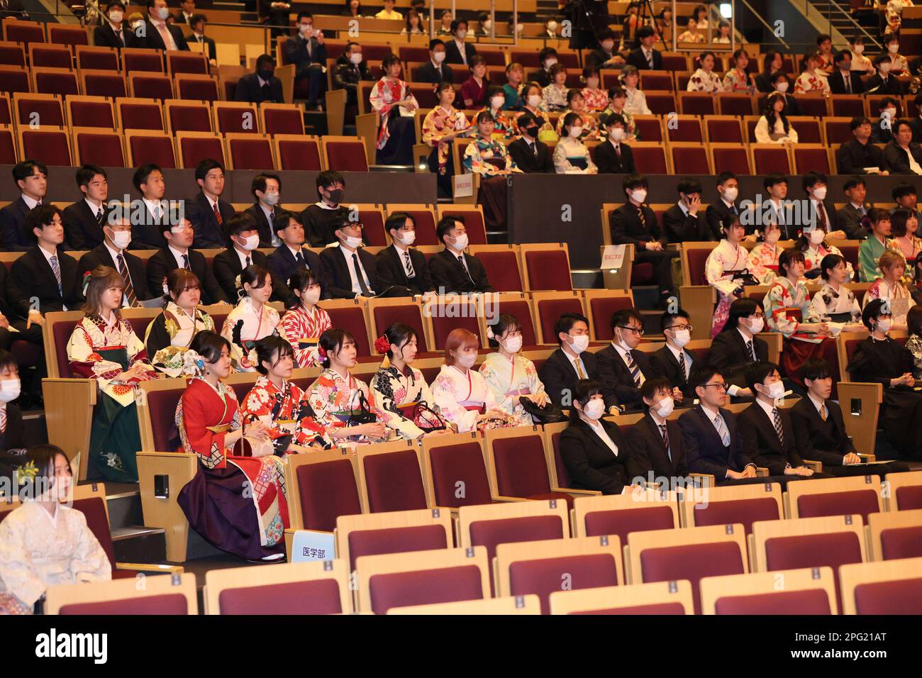 Students attend the graduation ceremony at Kyushu University Ito Campus ...
