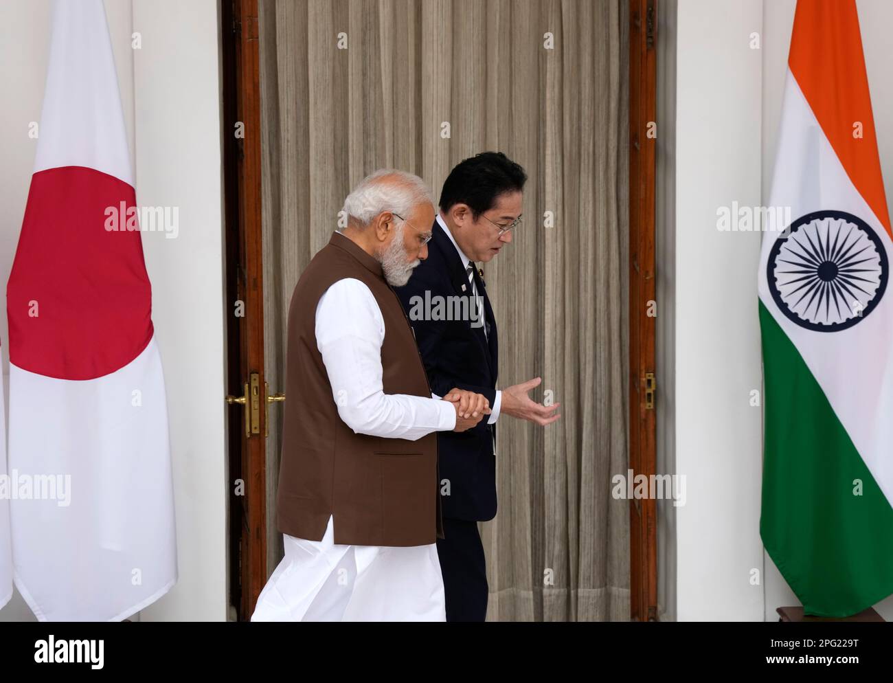 Japan’s Prime Minister Fumio Kishida, right and Indian Prime Minister ...