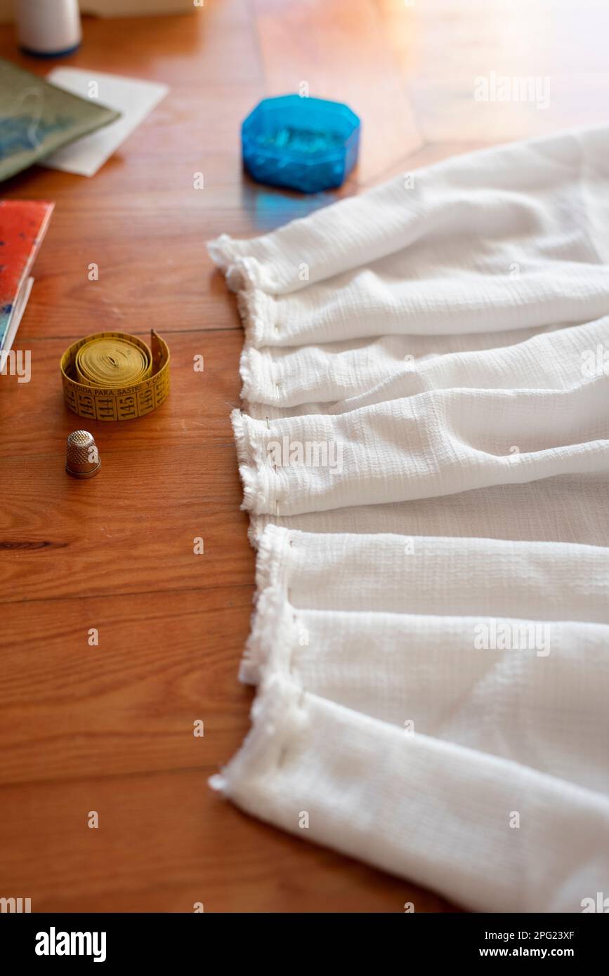 garment sewn by hand using sewing tools Stock Photo - Alamy