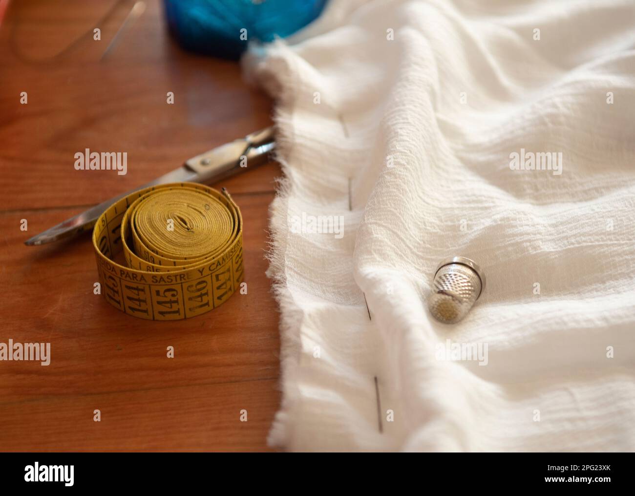 garment sewn by hand using sewing tools Stock Photo - Alamy