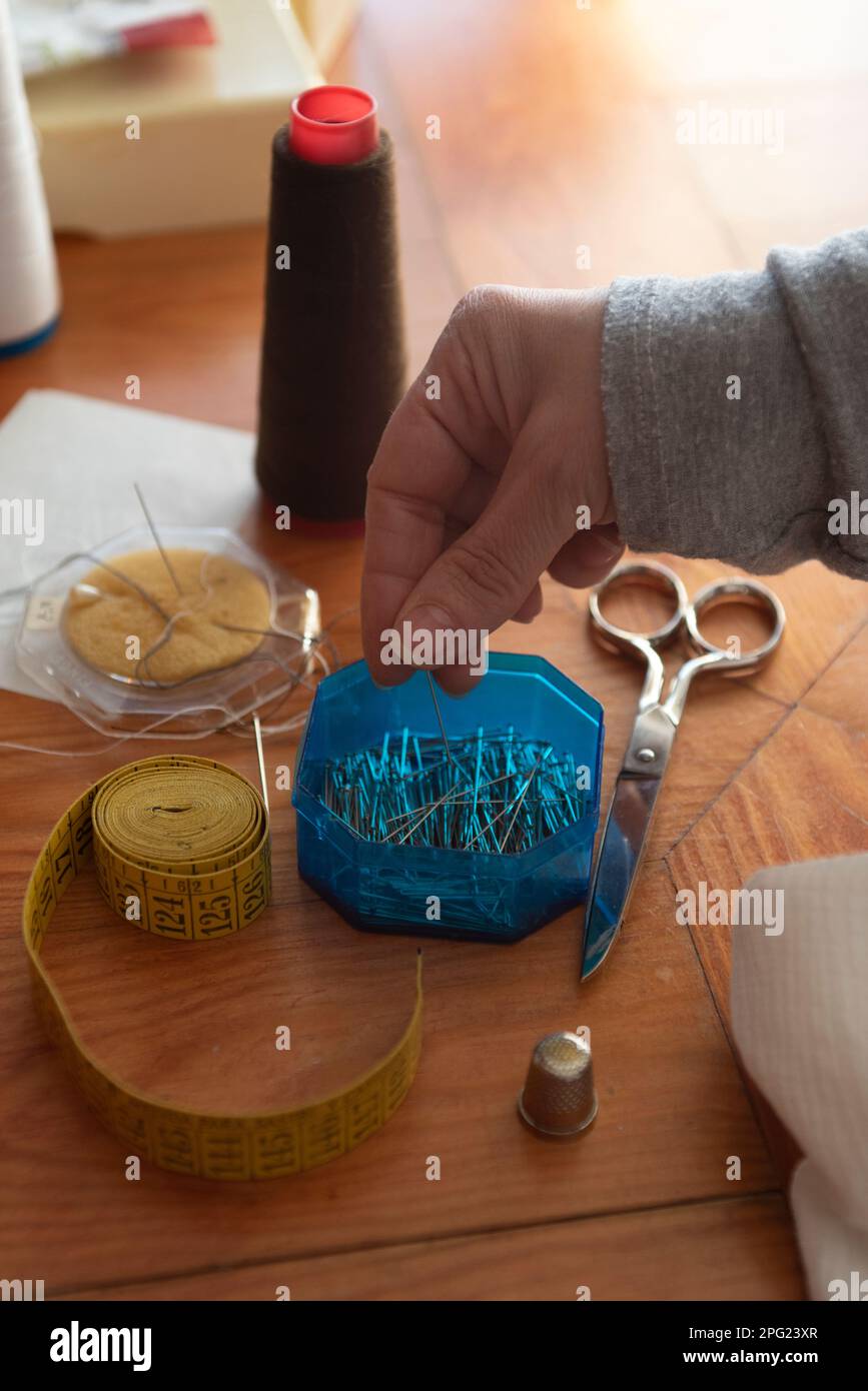 garment sewn by hand using sewing tools Stock Photo - Alamy