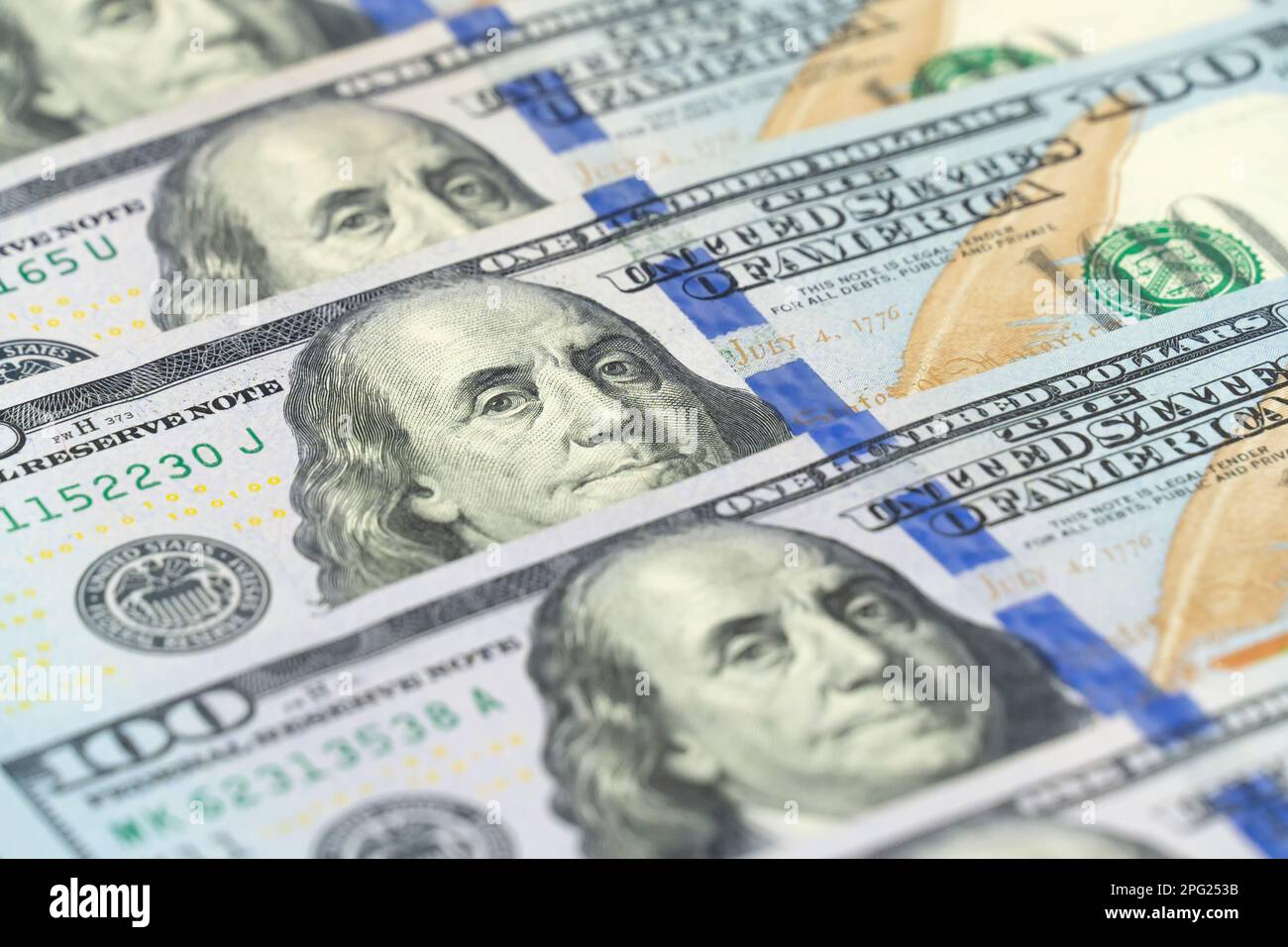 Macro photography of 100 dollar bills in a row. International currency ...