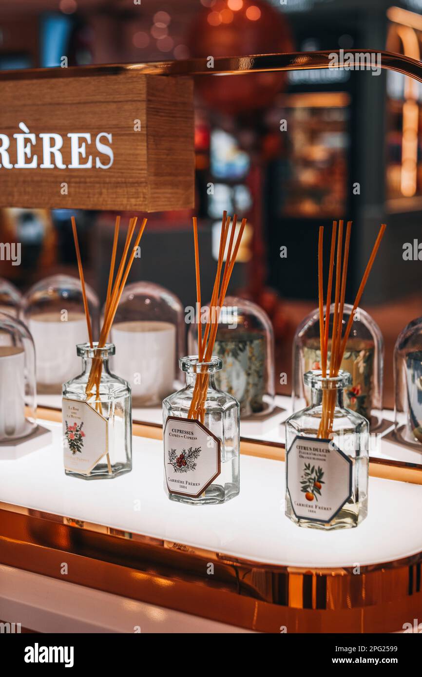 Aroma diffuser wooden sticks in the glass transparent bottle. Cozy home ...