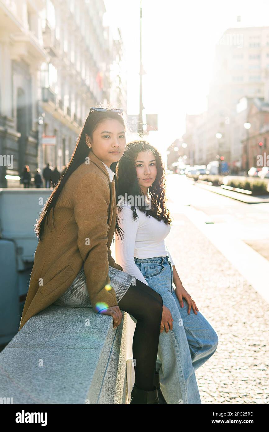 Stock photo of two friends with sunlight. Models posing Stock Photo - Alamy