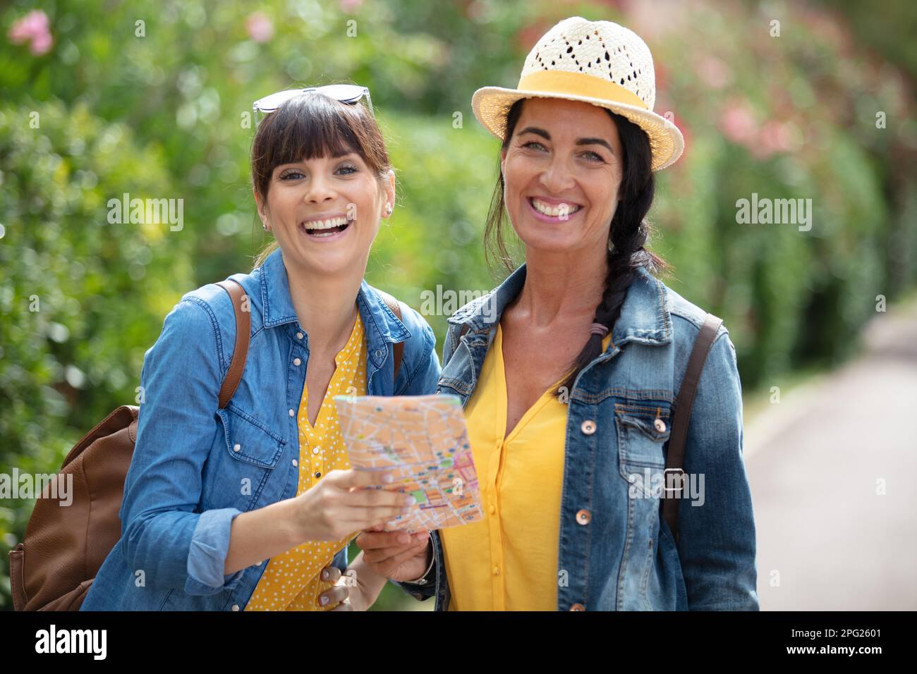 middle aged women hiking through countryside Stock Photo - Alamy