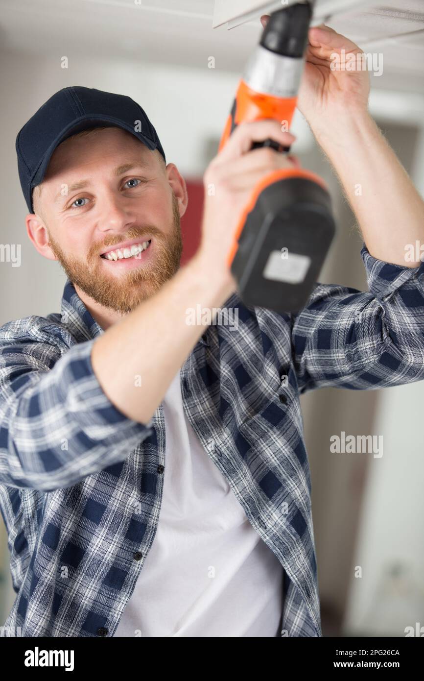 Ceiling drill and install hi-res stock photography and images - Alamy