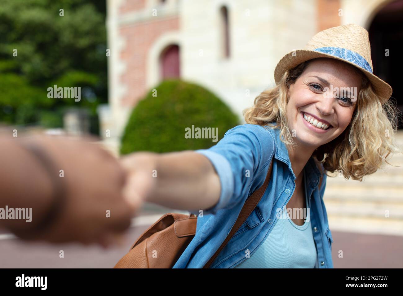 in love young woman holding boyfriend hands Stock Photo - Alamy