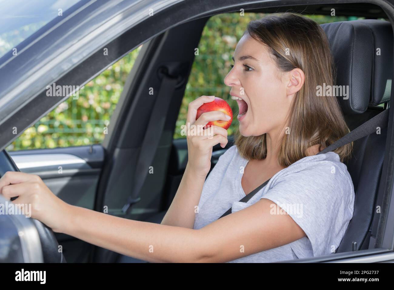 Driver eating hi-res stock photography and images - Alamy