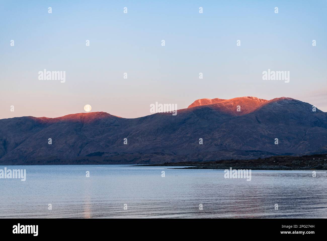 Full moon over a mountain ridge in the Scottish highlands Stock Photo ...
