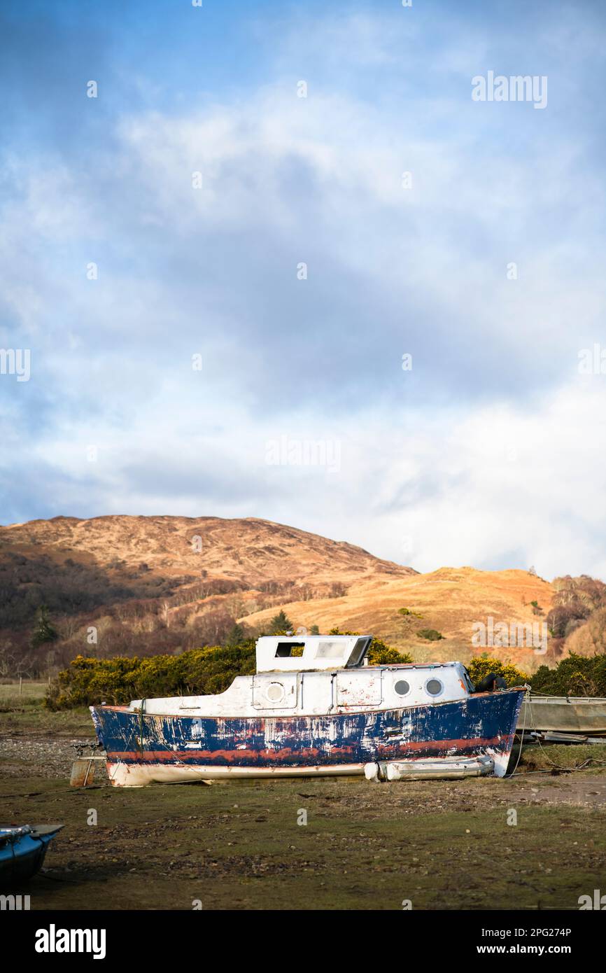 An abandoned scuttled boat in Scottish highlands Stock Photo - Alamy