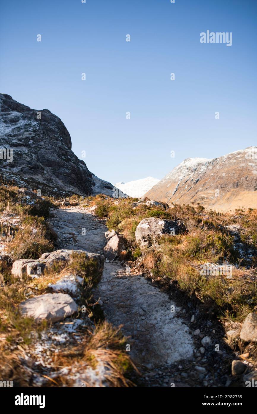 Trail through the mountains of the Scottish Highlands Stock Photo - Alamy