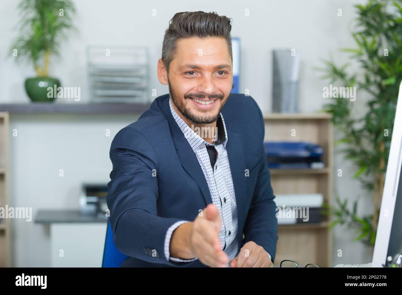 Hand reaching forward hi-res stock photography and images - Alamy