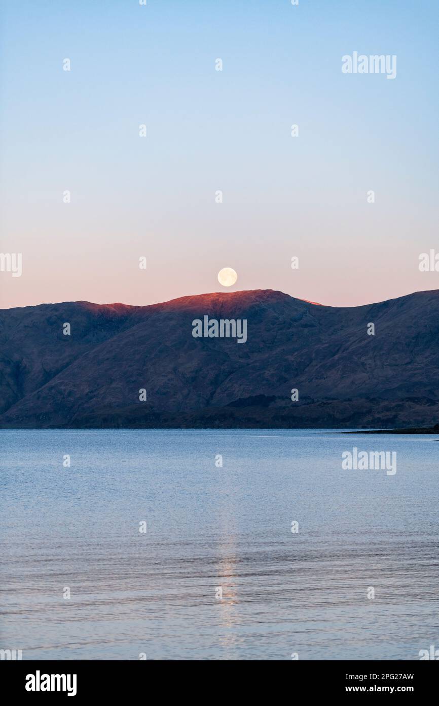 Full moon over a mountain ridge in the Scottish highlands Stock Photo ...