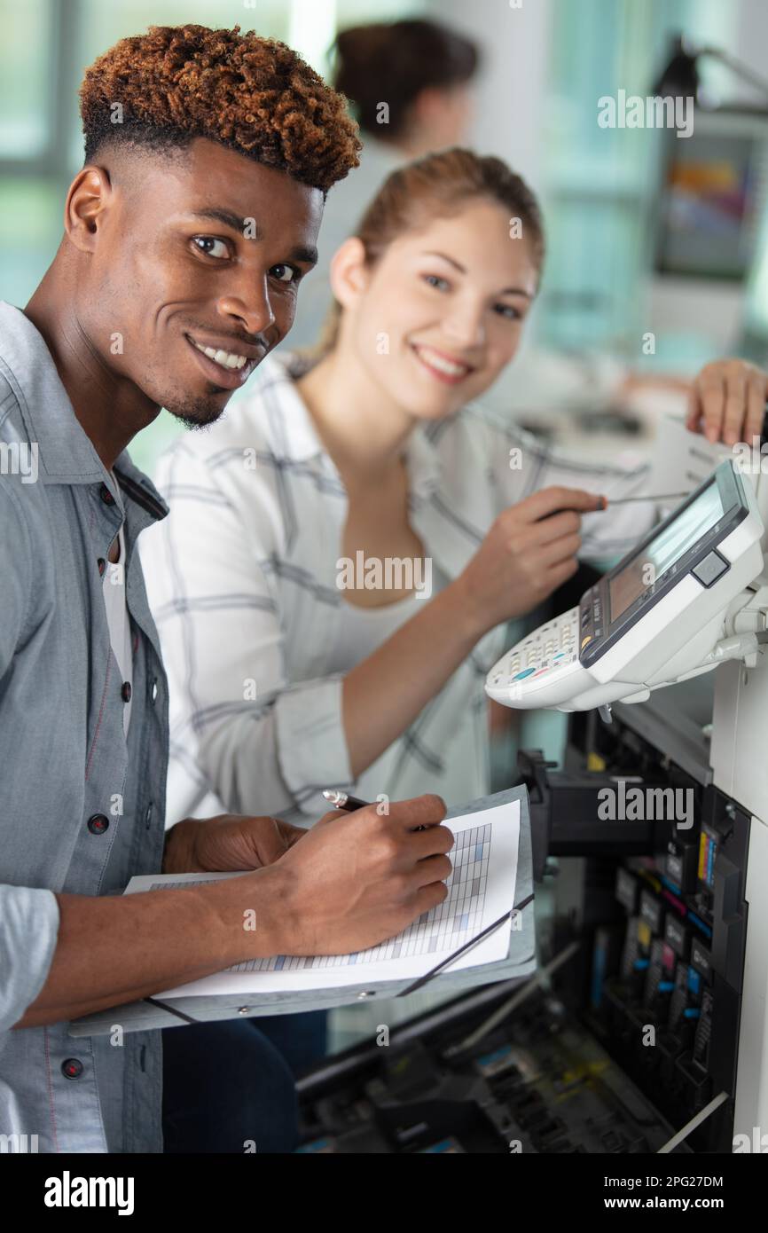 engineering students using an innovative printer Stock Photo - Alamy