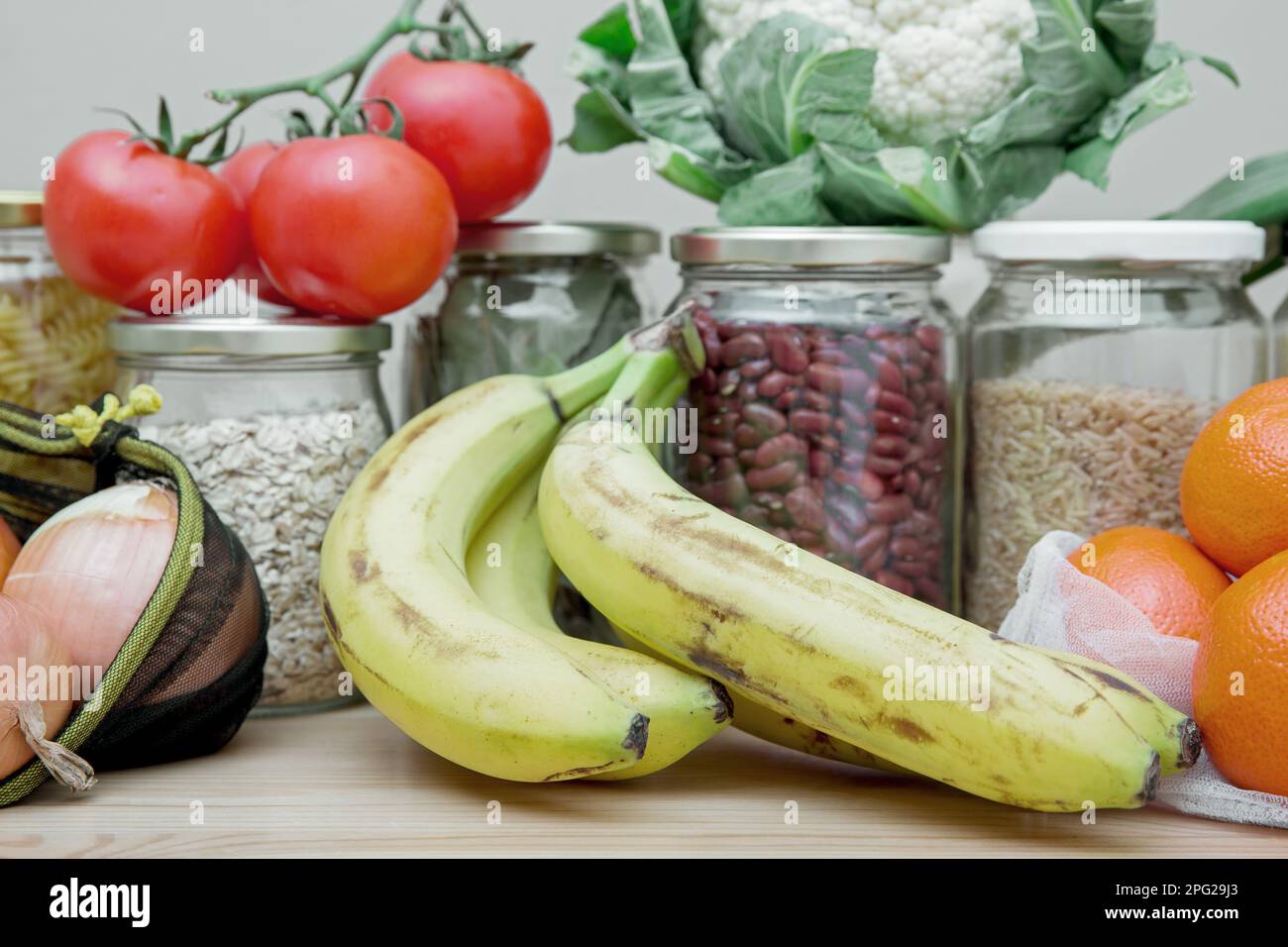 Composition of food in reusable packaging, mesh bags and glass jars ...