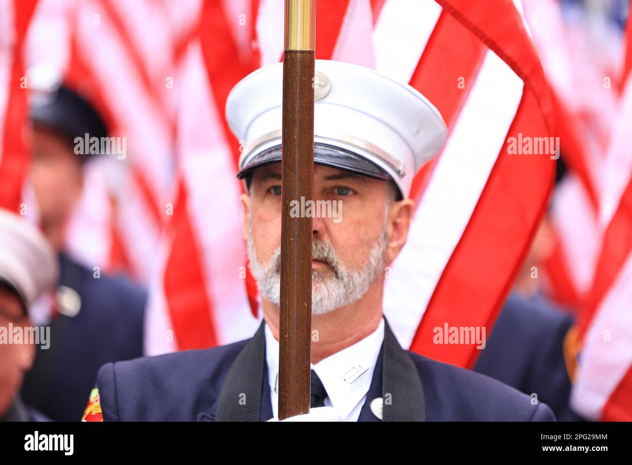 Members of the New York City Fire Department Color Guard carry flags ...