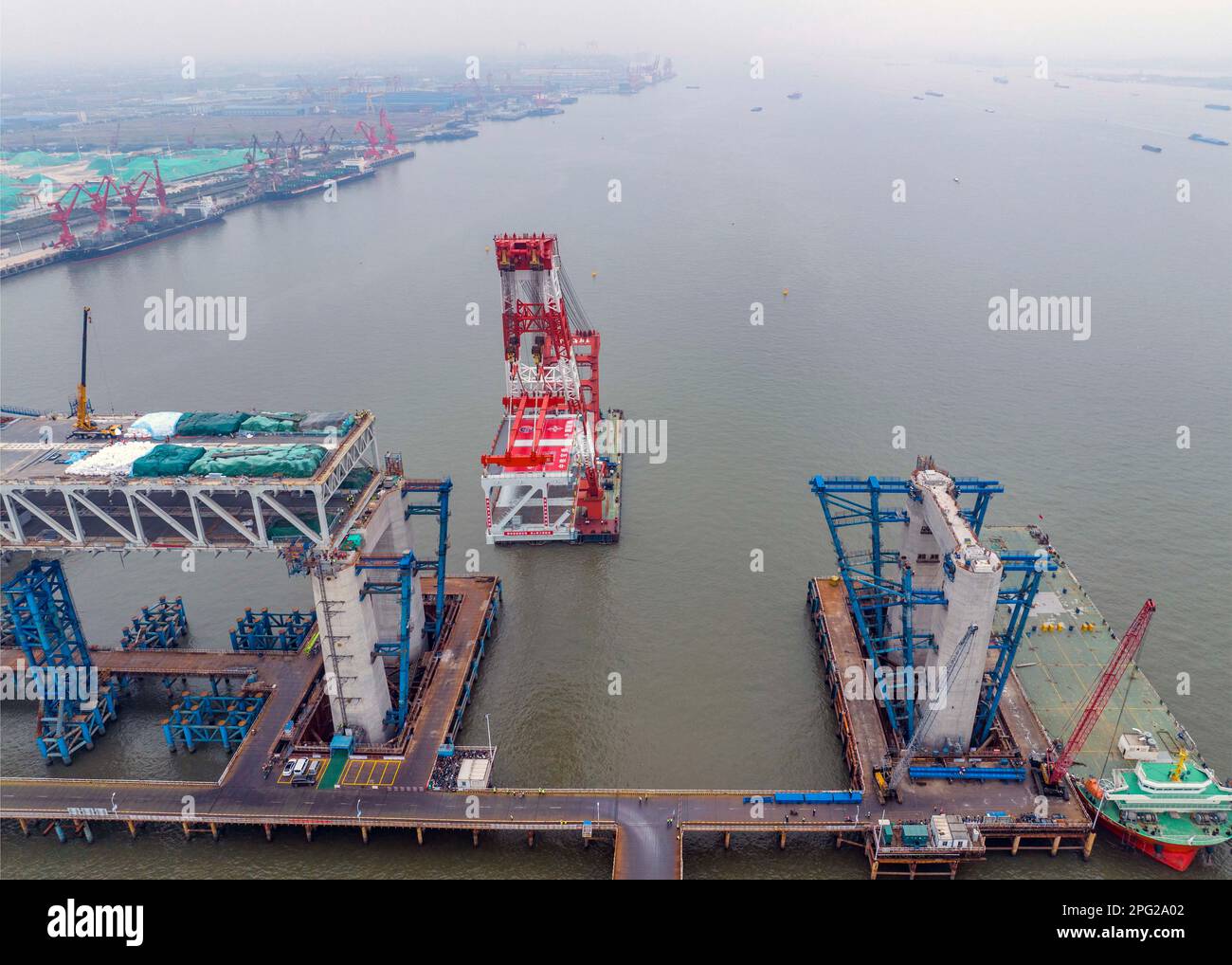 TAIZHOU, CHINA - MARCH 20, 2023 - A steel girder is erected at the ...