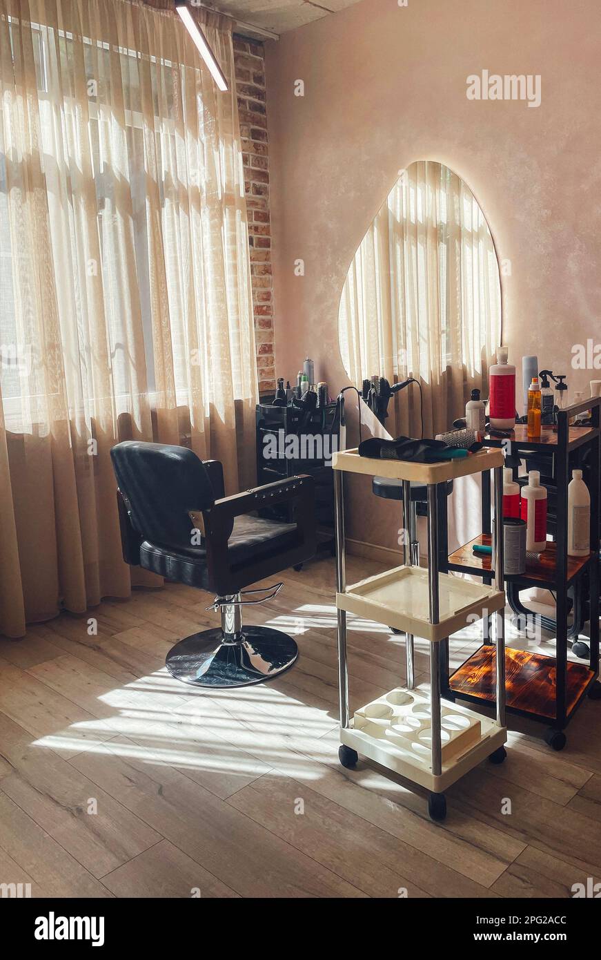 Empty work place for hairdresser in beauty salon. Comfortable black ...