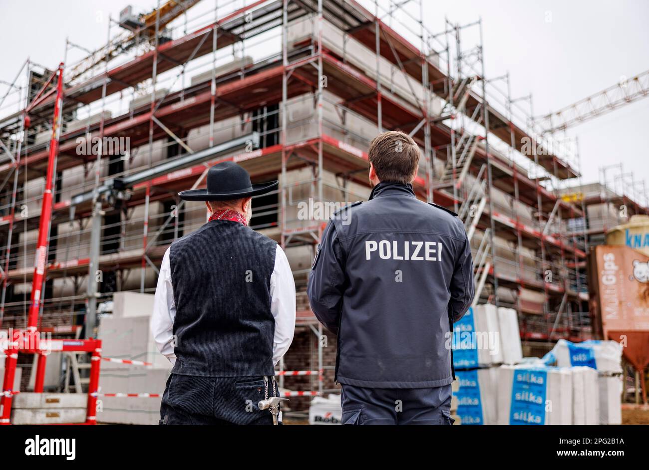 Eutin, Germany. 20th Mar, 2023. A master carpenter and a police officer ...