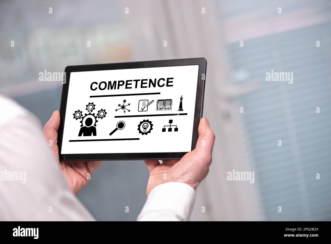 Competence concept shown on a tablet held by a man Stock Photo - Alamy