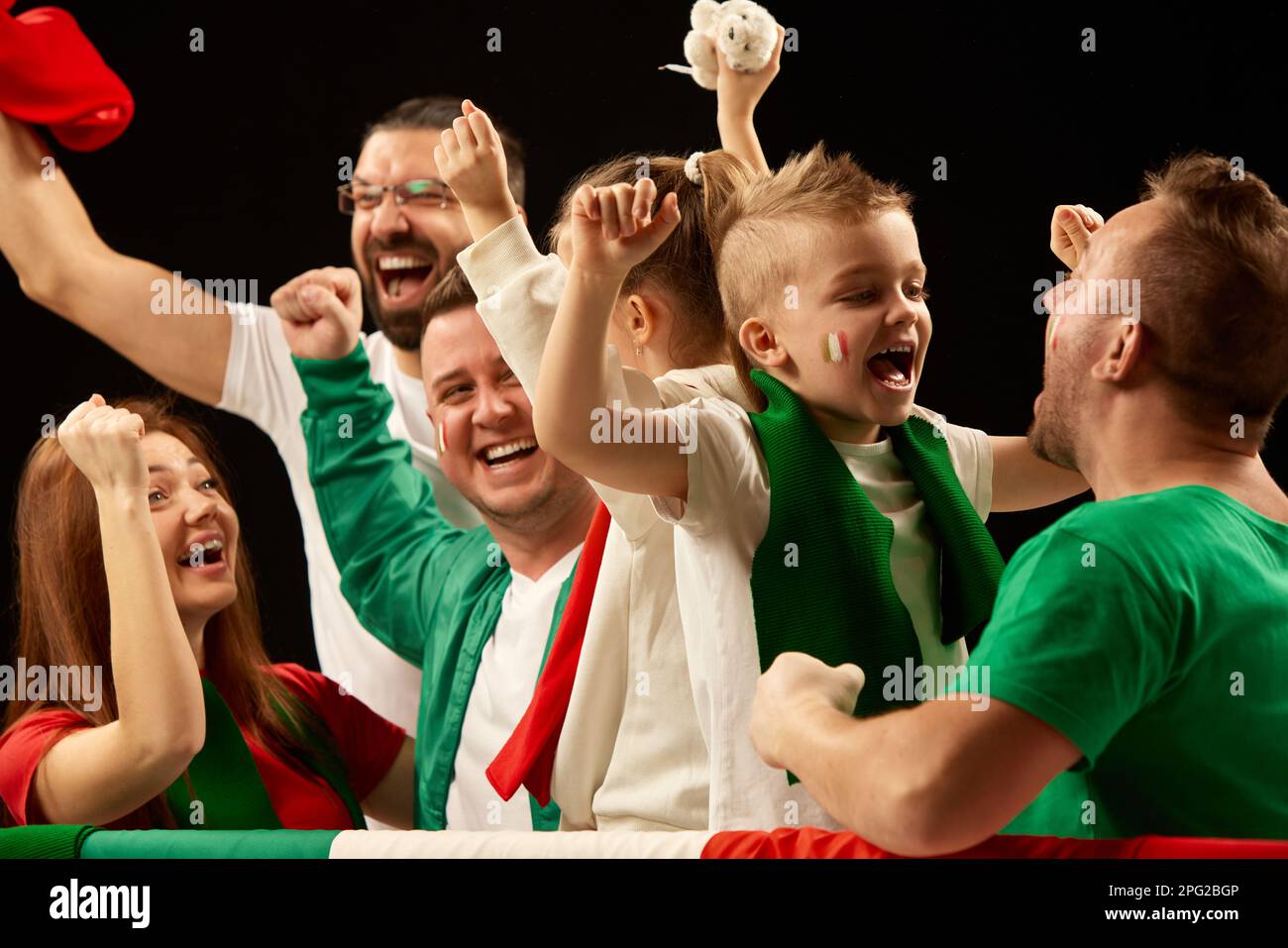 Football, soccer fans with flag emotionally cheering up favourite team ...